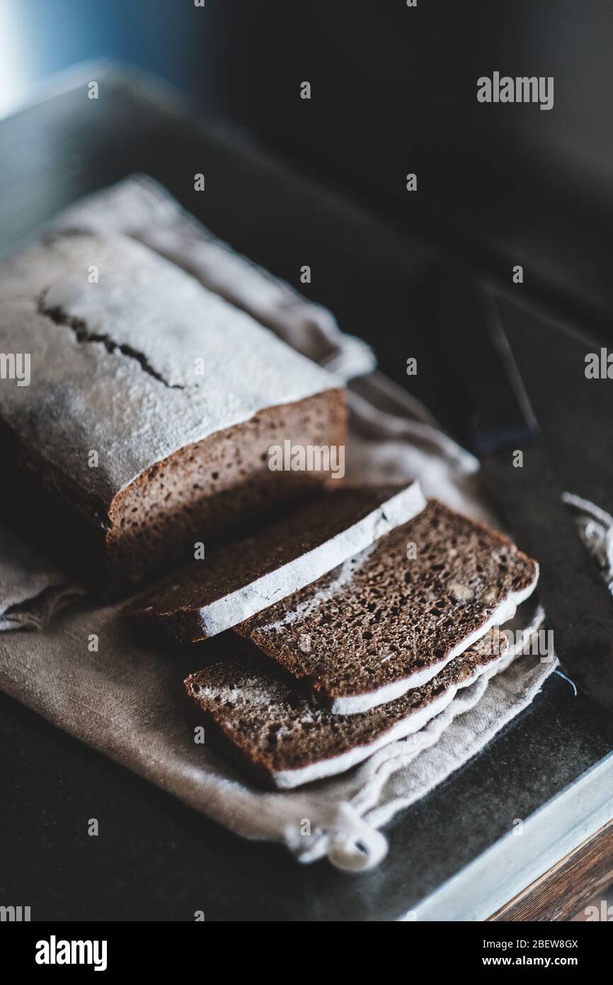 Healthy rye Swedish bread cut in slices over kitchen counter Stock ...