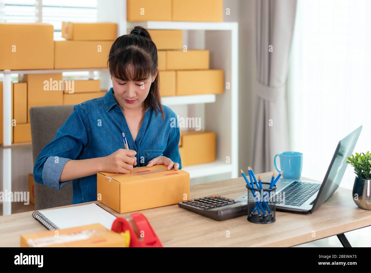 Asian teenager owner business woman work at home for online shopping ...