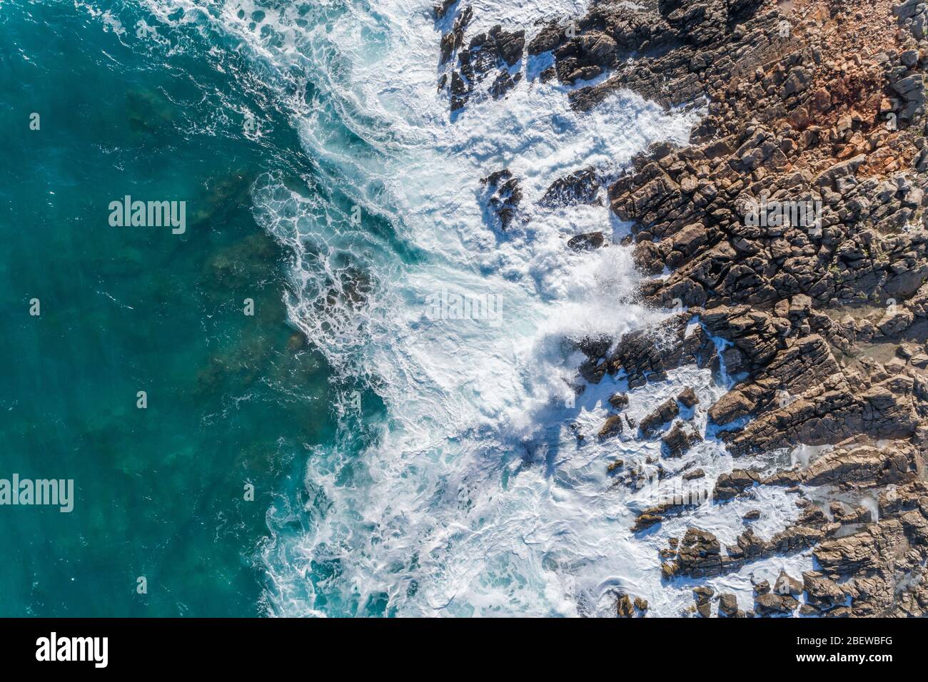 Aerial view of Ploce beach and storm waves on the Montenegrin coast ...
