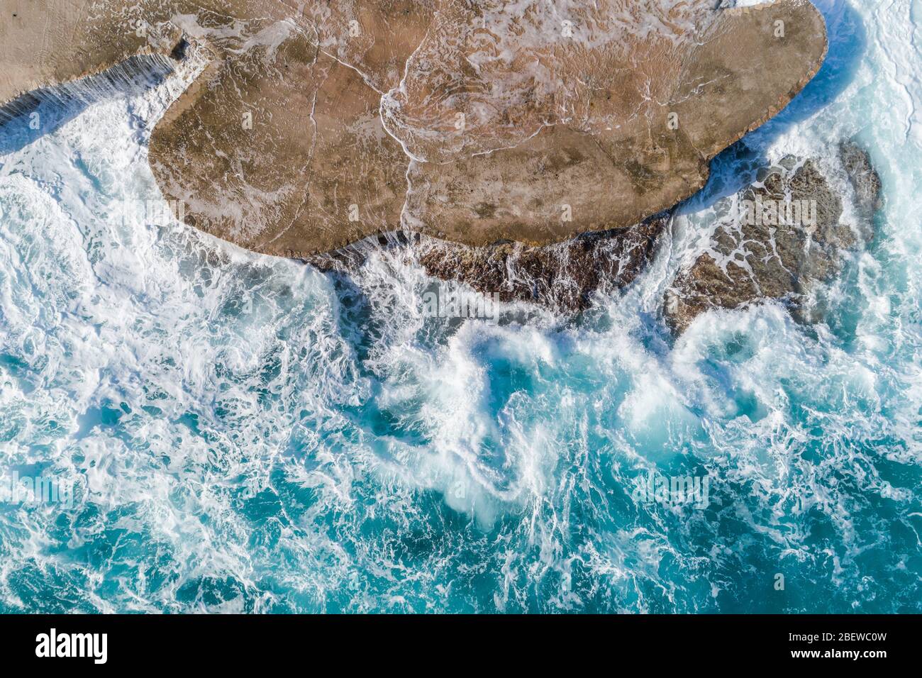 Aerial view of Ploce beach and storm waves on the Montenegrin coast ...