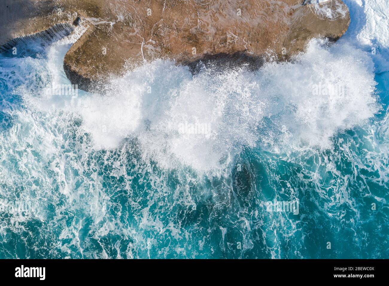 Aerial view of Ploce beach and storm waves on the Montenegrin coast ...