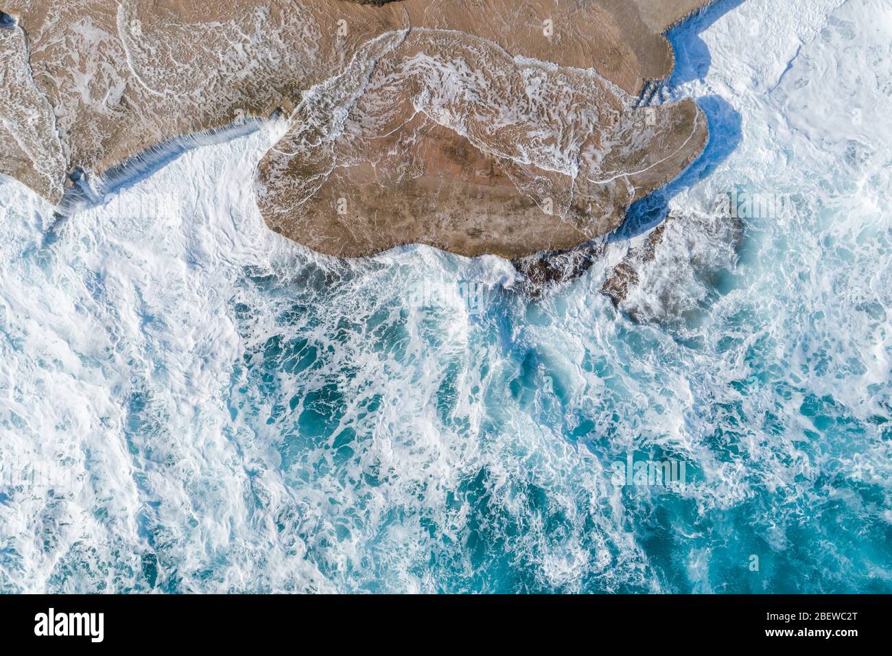 Aerial view of Ploce beach and storm waves on the Montenegrin coast ...