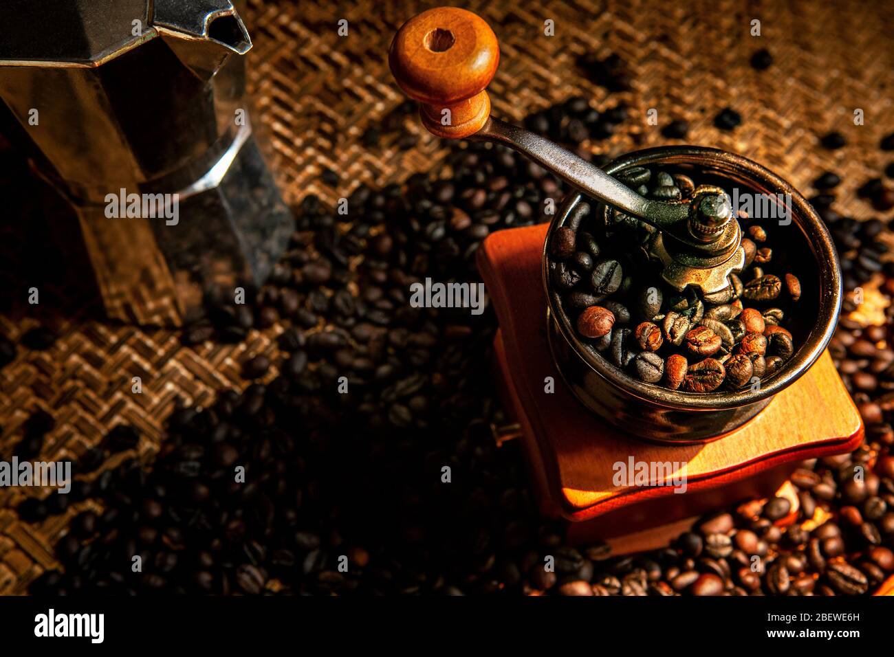 roasted coffee seed in vintage grinder preparing to boil by espresso ...