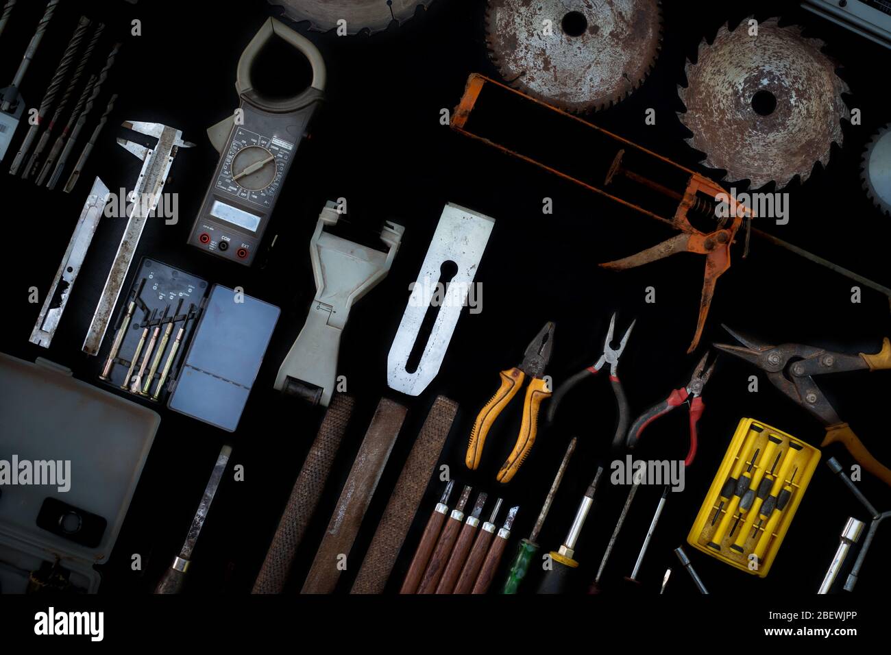 Photo top view a huge set collection of working hand and power tools ...