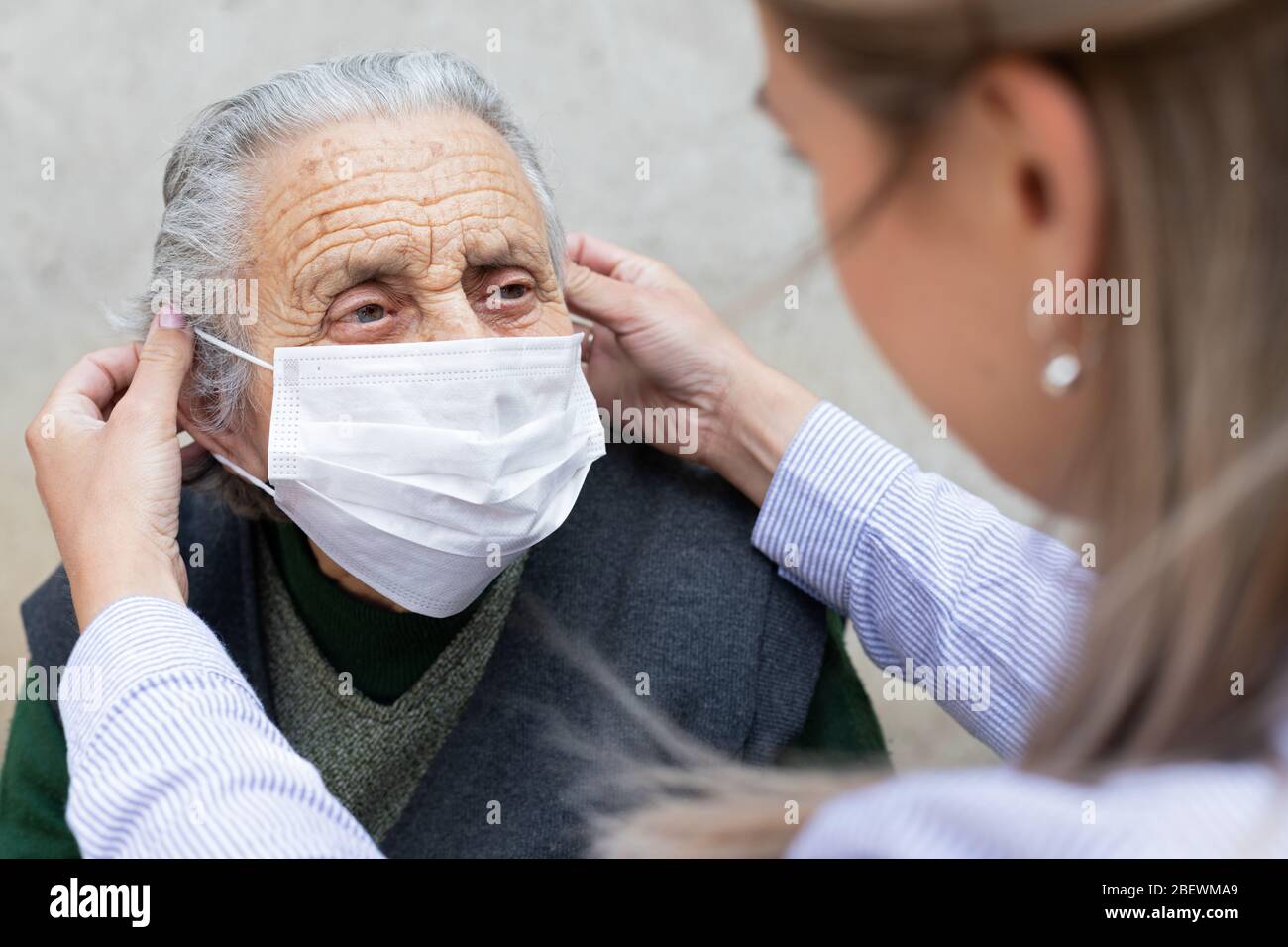 Nursing home elderly nurse mask hi-res stock photography and images - Alamy