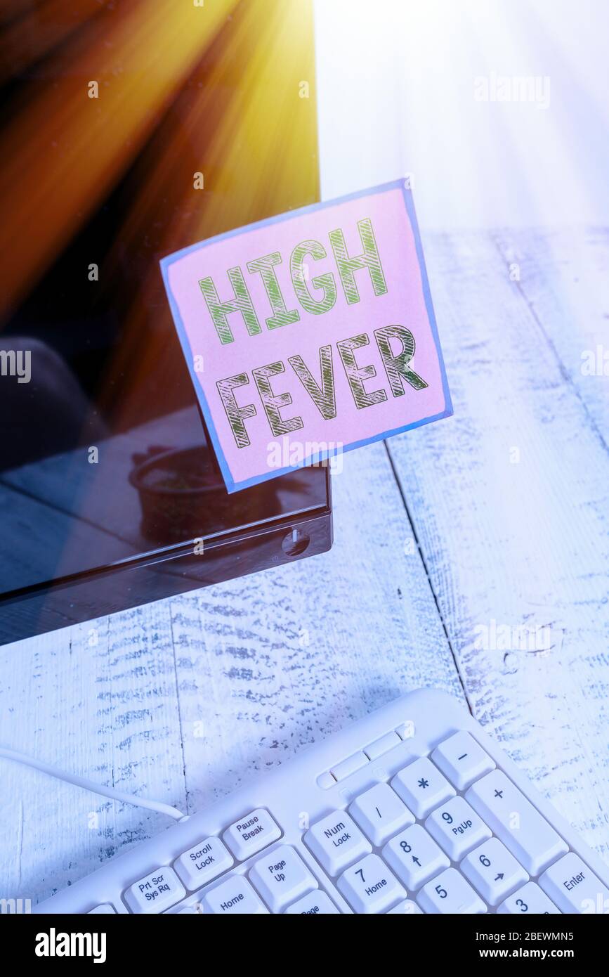 Writing note showing High Fever. Business concept for medical condition ...