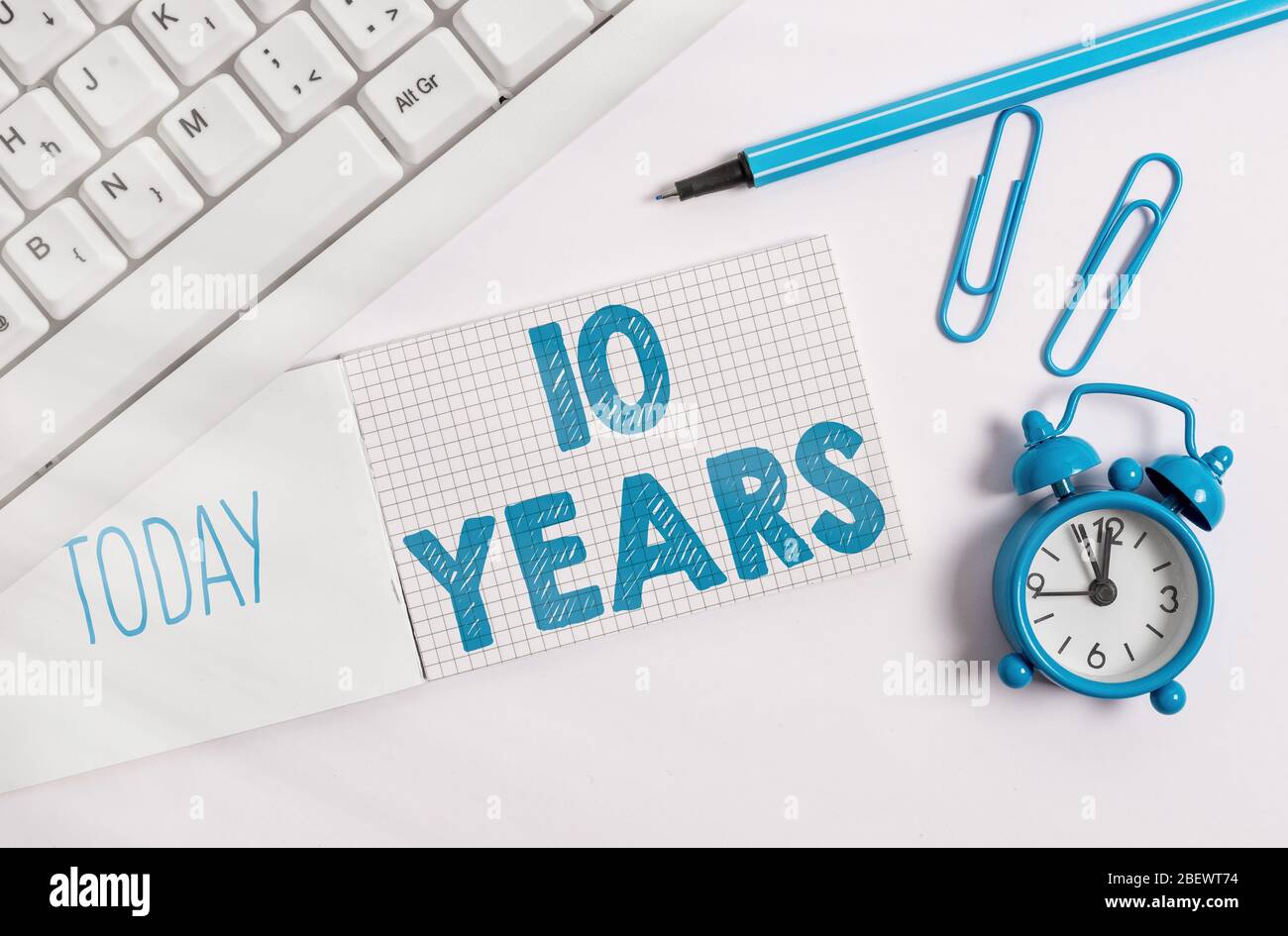 Writing note showing 10 Years. Business concept for Remembering or ...