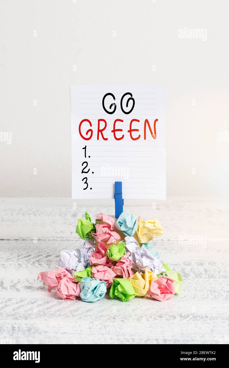 Conceptual hand writing showing Go Green. Concept meaning making more ...