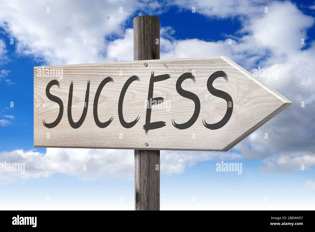Success - wooden signpost with one arrow Stock Photo - Alamy