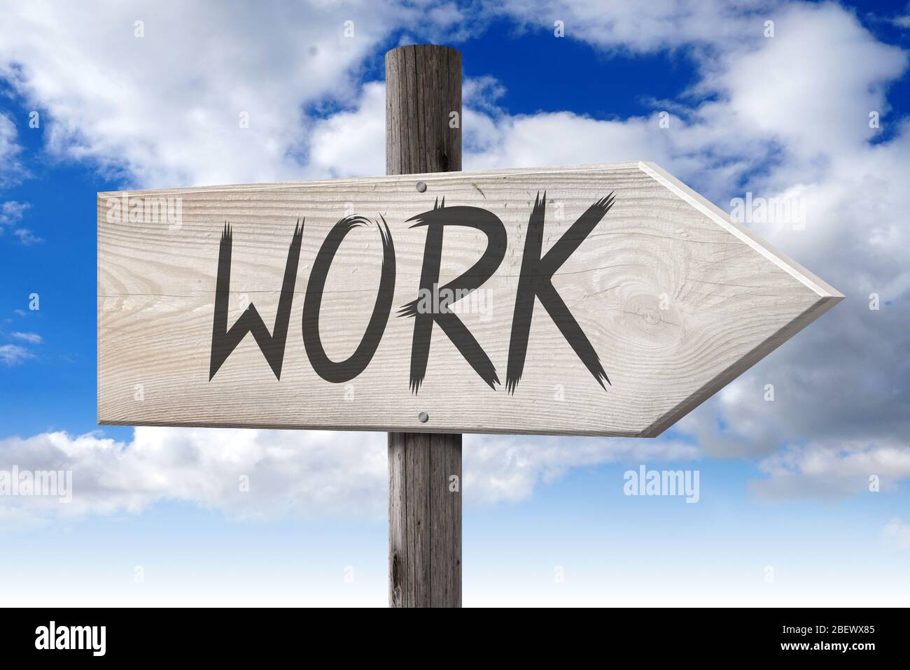 Work - wooden signpost with one arrow Stock Photo - Alamy