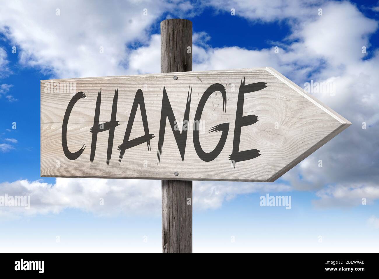 Change - wooden signpost with one arrow Stock Photo - Alamy