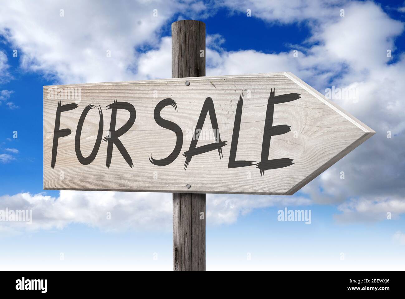 For sale - wooden signpost with one arrow Stock Photo - Alamy