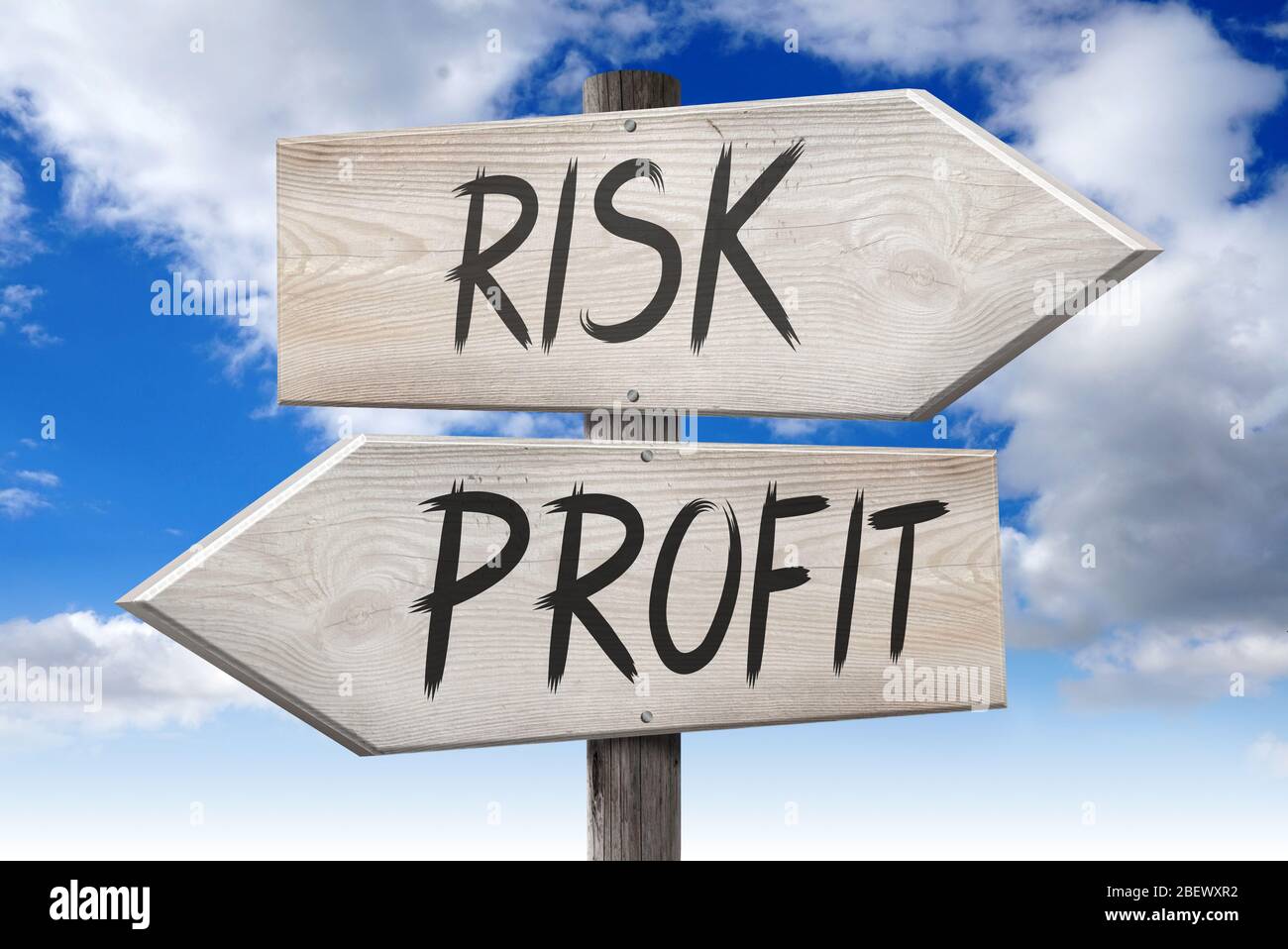 Wooden signpost with two arrows Stock Photo - Alamy