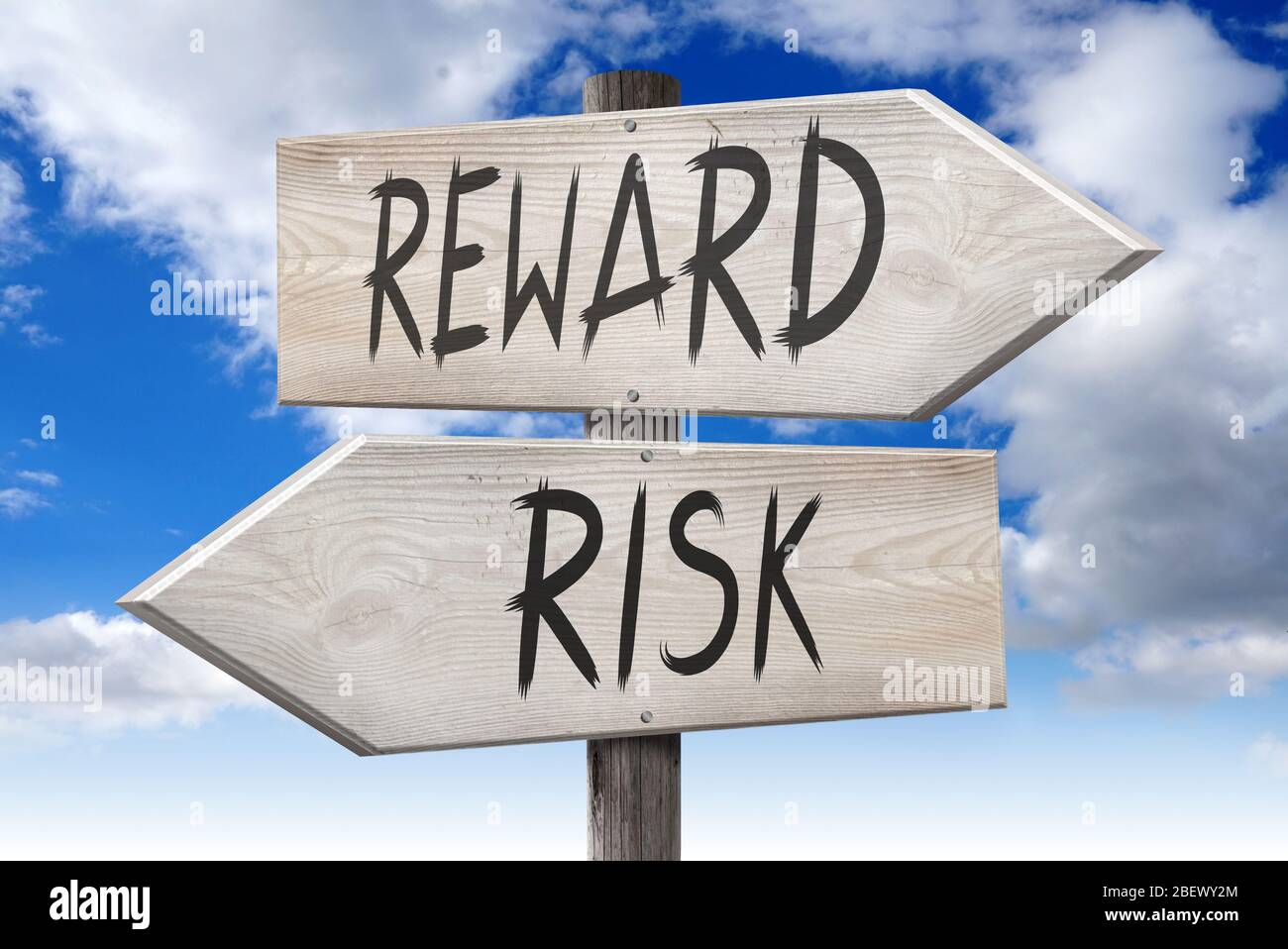 Wooden signpost with two arrows Stock Photo - Alamy