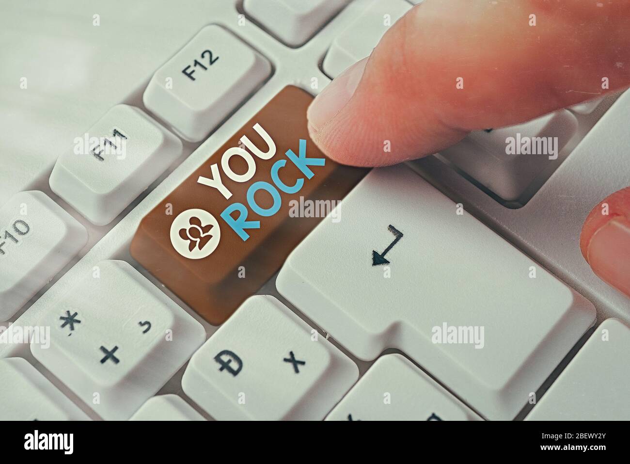 Writing note showing You Rock. Business concept for slang phrase of ...