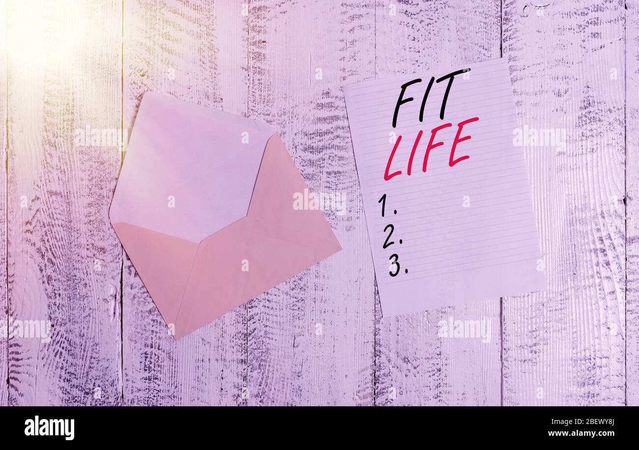 Handwriting text Fit Life. Conceptual photo maintaining a healthy ...