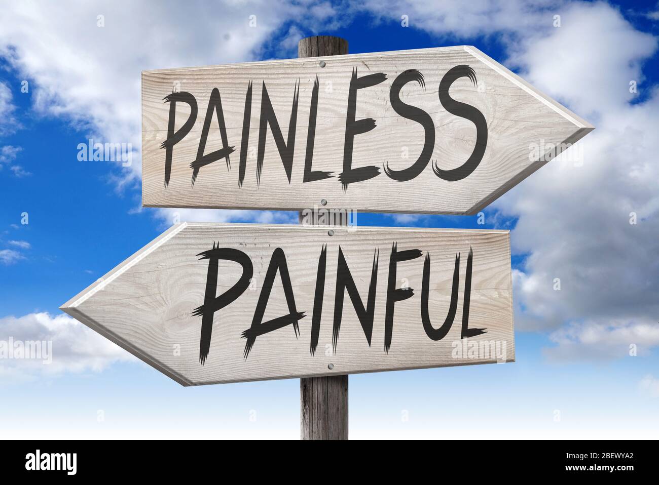 Wooden signpost with two arrows Stock Photo - Alamy