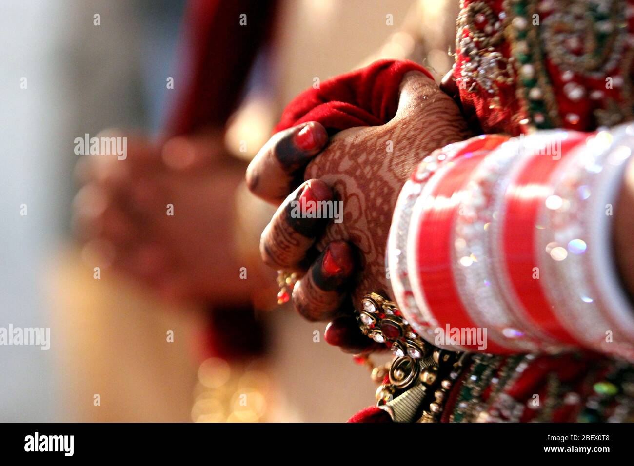 Wedding bride hand photo in india Stock Photo - Alamy