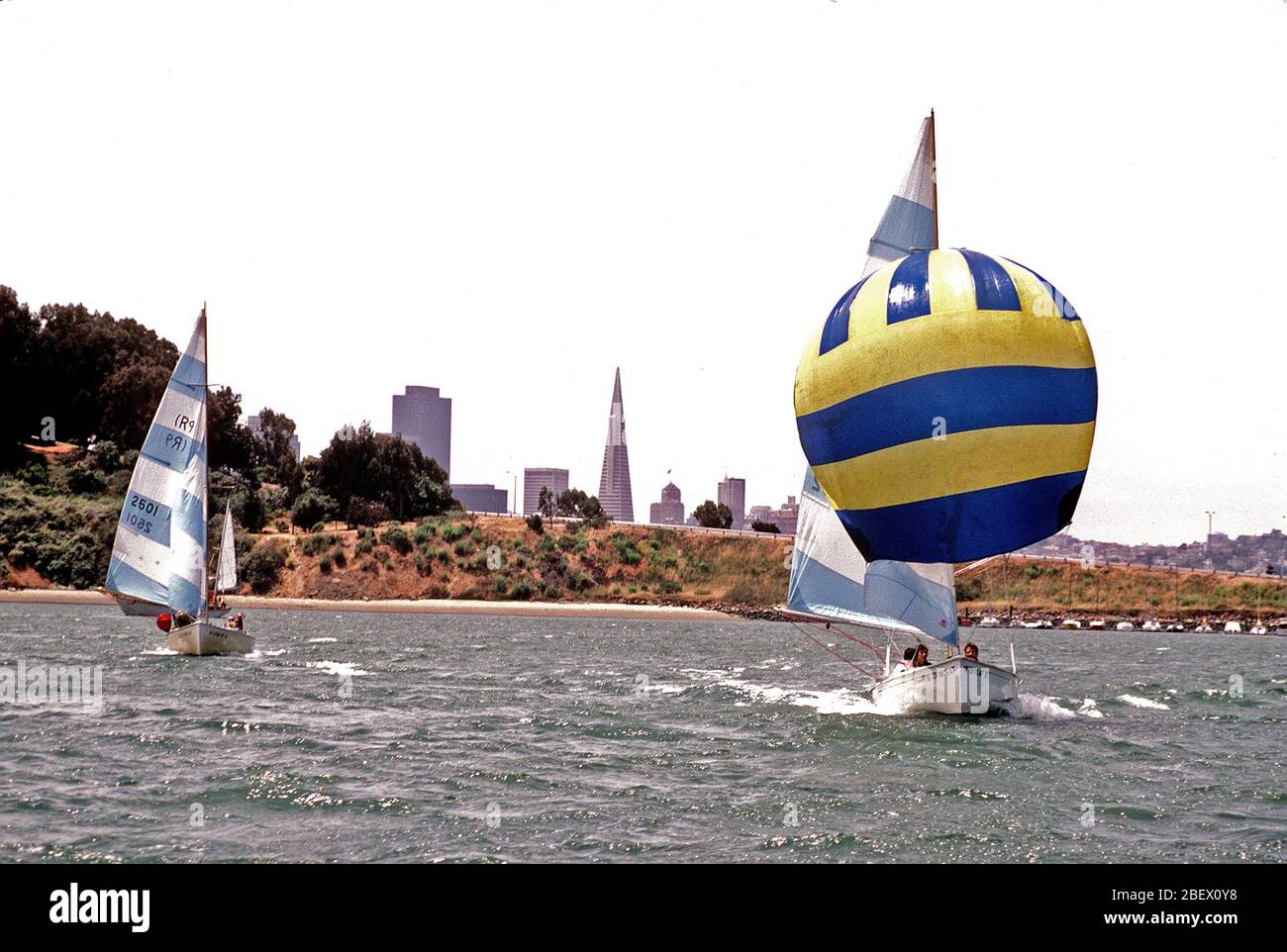 1982 - Two sail boats complete against each other during the Treasure ...