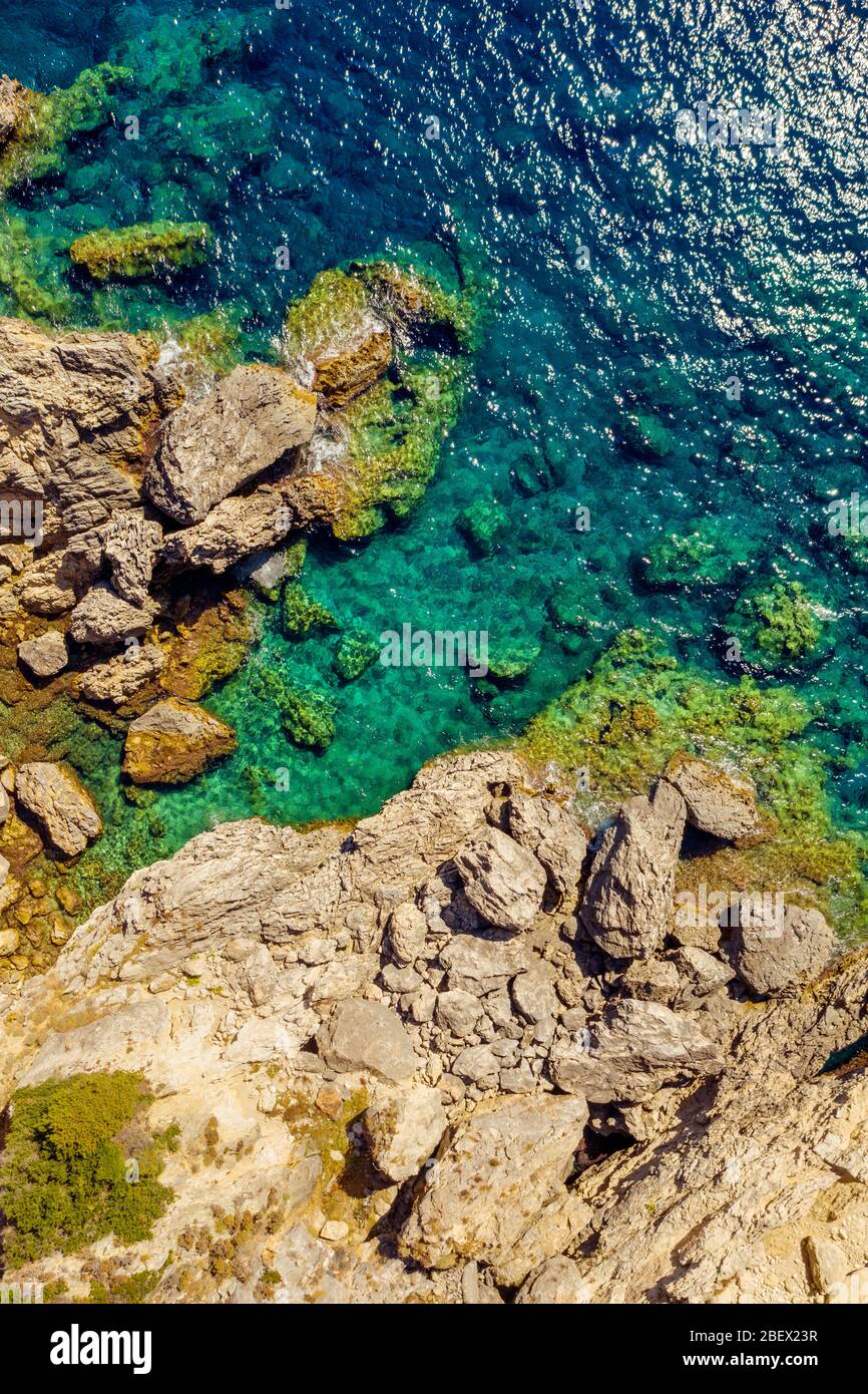 Aerial view of beautiful rocky mediterranean coast, seabed seen from ...