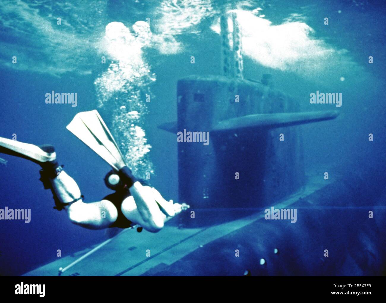 1980 - Senior Chief Photographer's Mate, Diver David Graver, collects ...