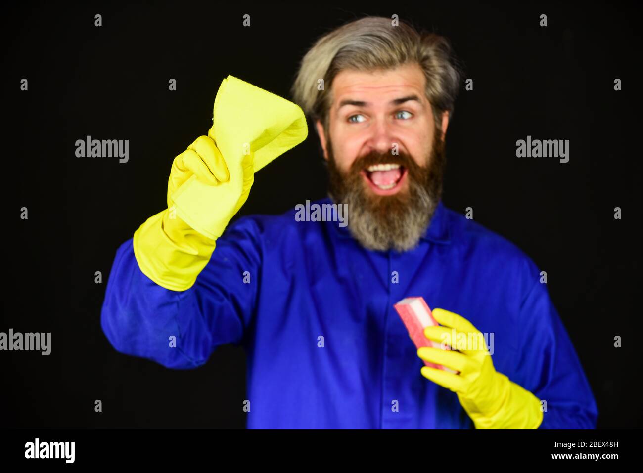 Man using dust mop hi-res stock photography and images - Alamy