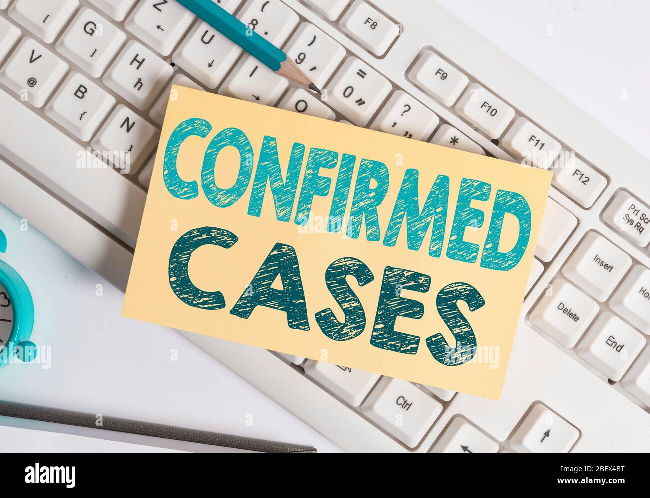 Writing note showing Confirmed Cases. Business concept for set of ...