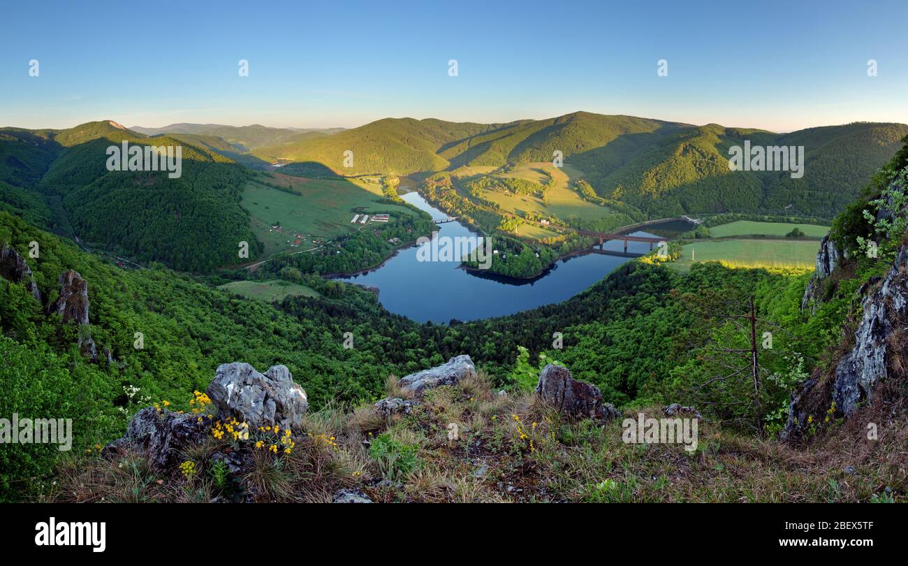 Beautiful Slovakian panoramic landscape with a rock and river down in ...