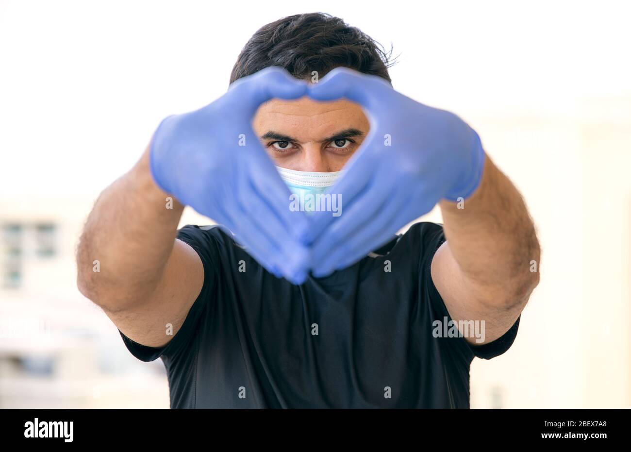 arab man with a mask and rubber gloves during pandemic Stock Photo - Alamy
