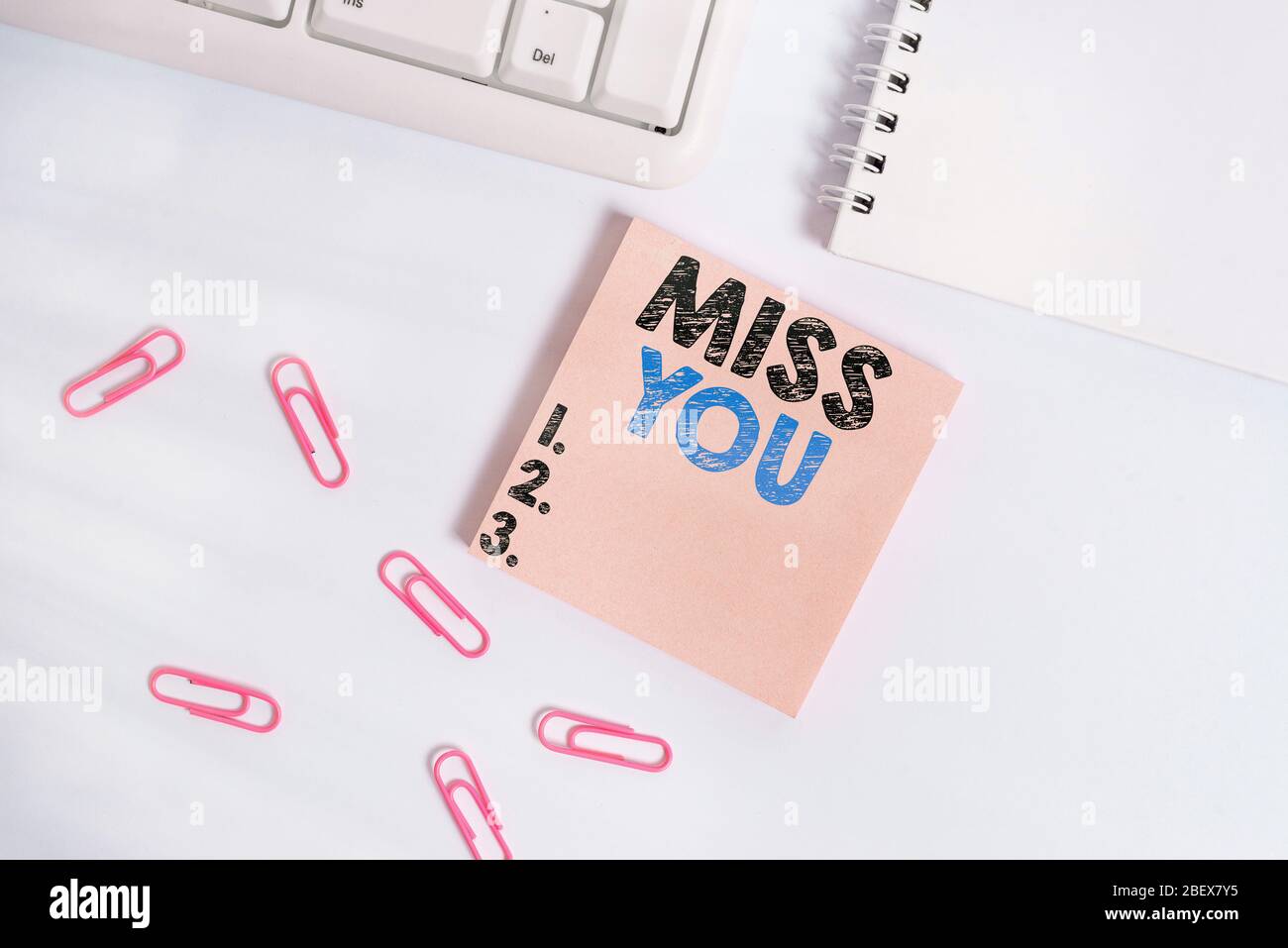 Writing note showing Miss You. Business concept for Feeling sad because ...