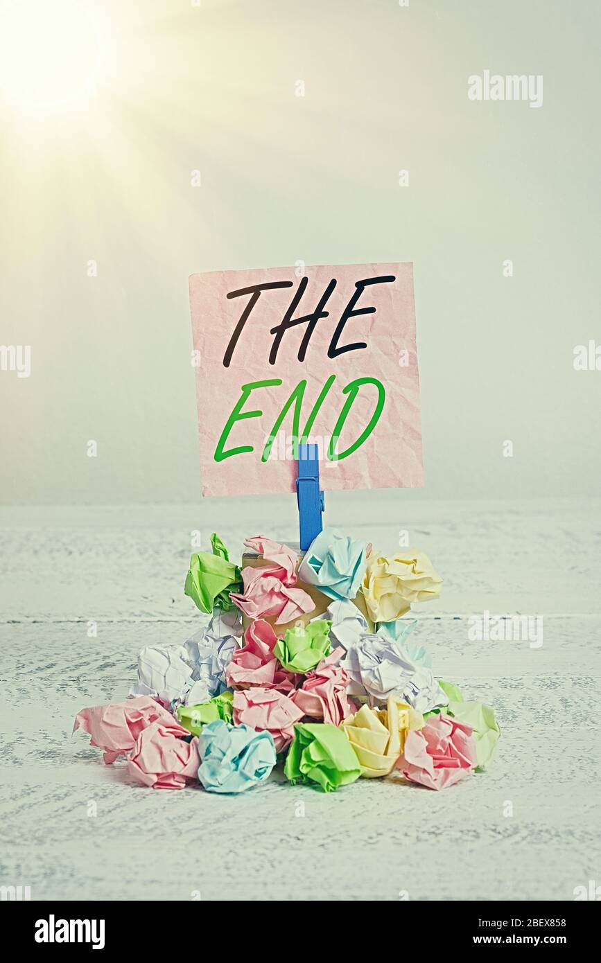 Conceptual hand writing showing The End. Concept meaning Final part of ...