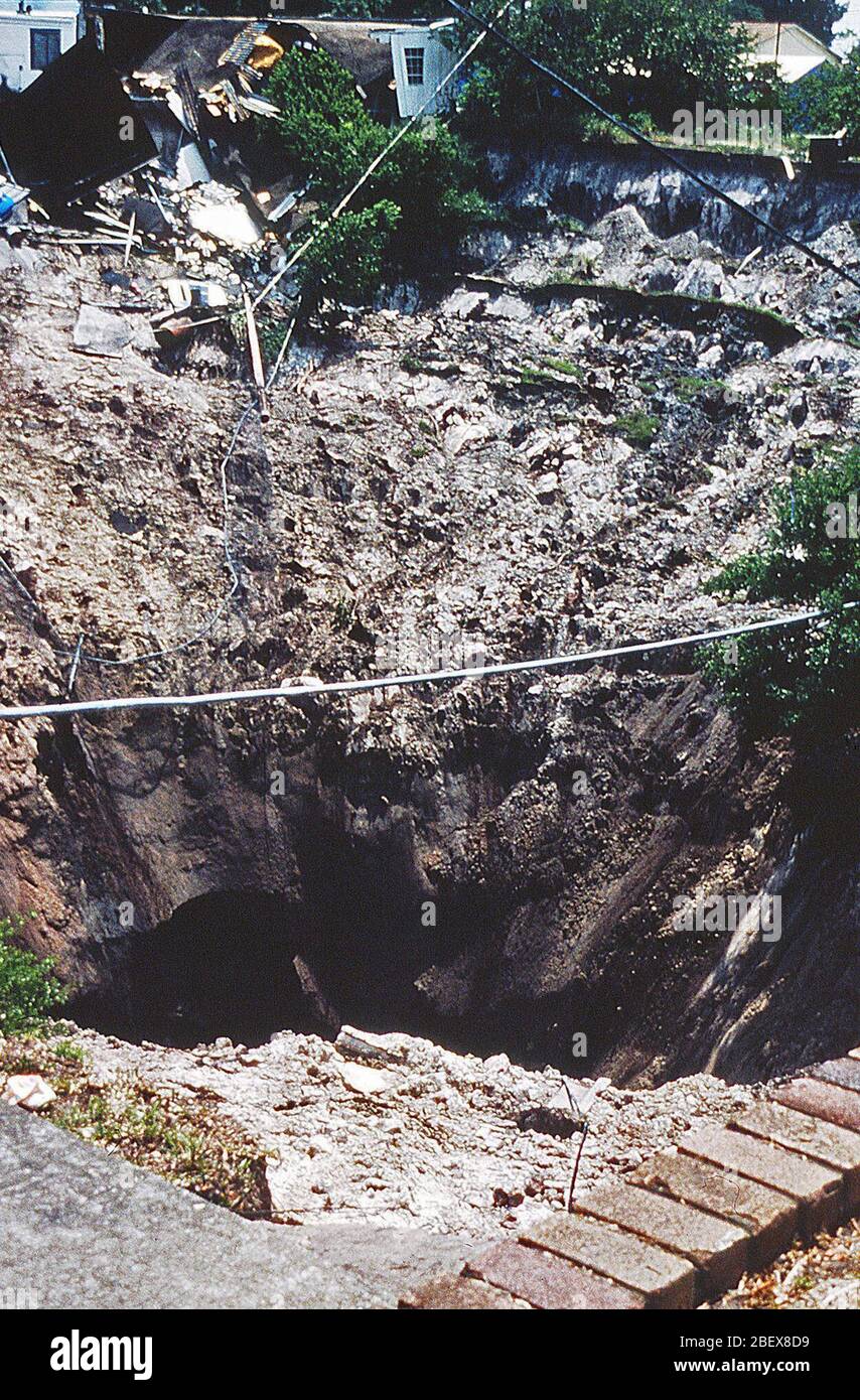 Sinkhole chimney after pool collapse. View to south across the ...