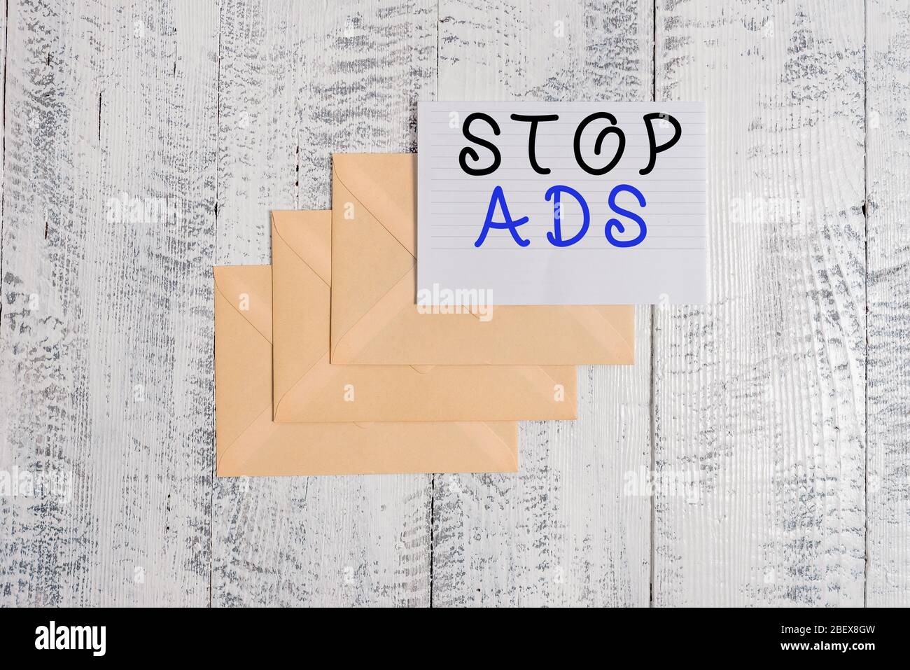 Handwriting text Stop Ads. Conceptual photo program that will remove ...