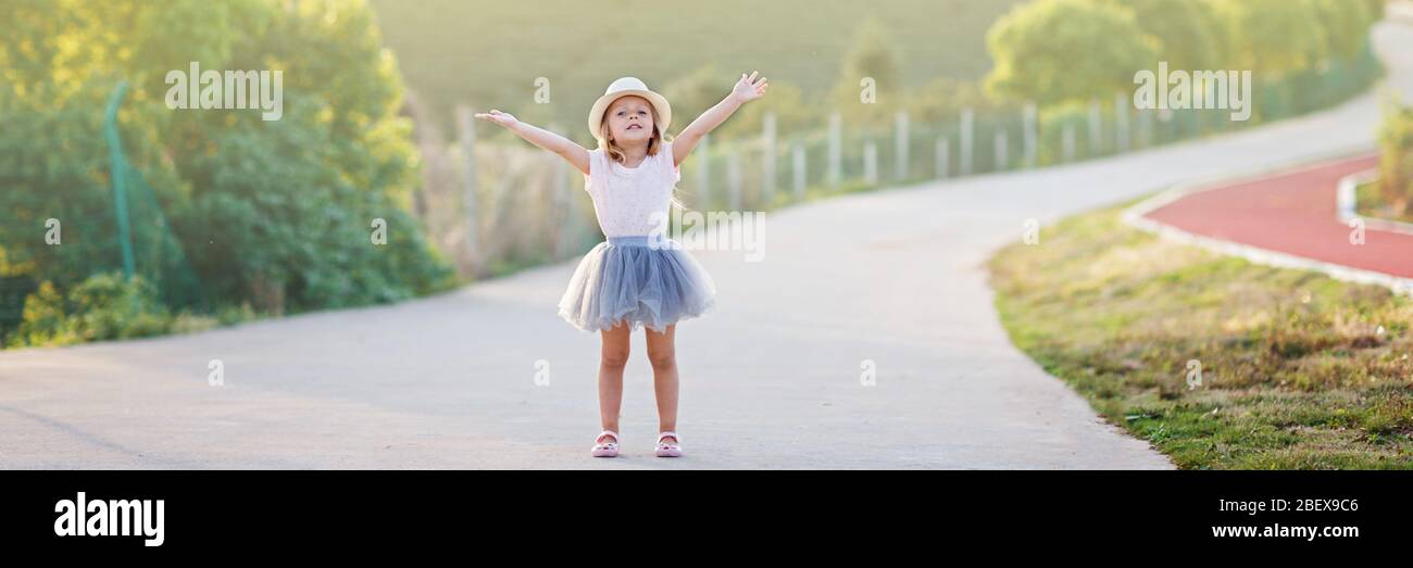Portrait of adorable little girl with long blonde hair outdoor. Free ...