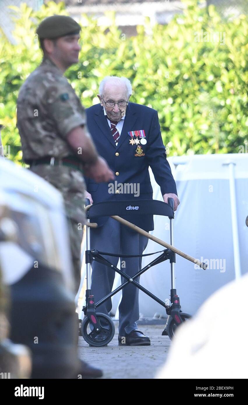 Captain Tom Moore, a 99-year-old veteran, completing the 100th length ...