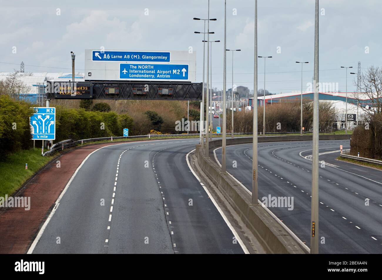 empty m2 motorway with wash hands regularly motorway sign during ...