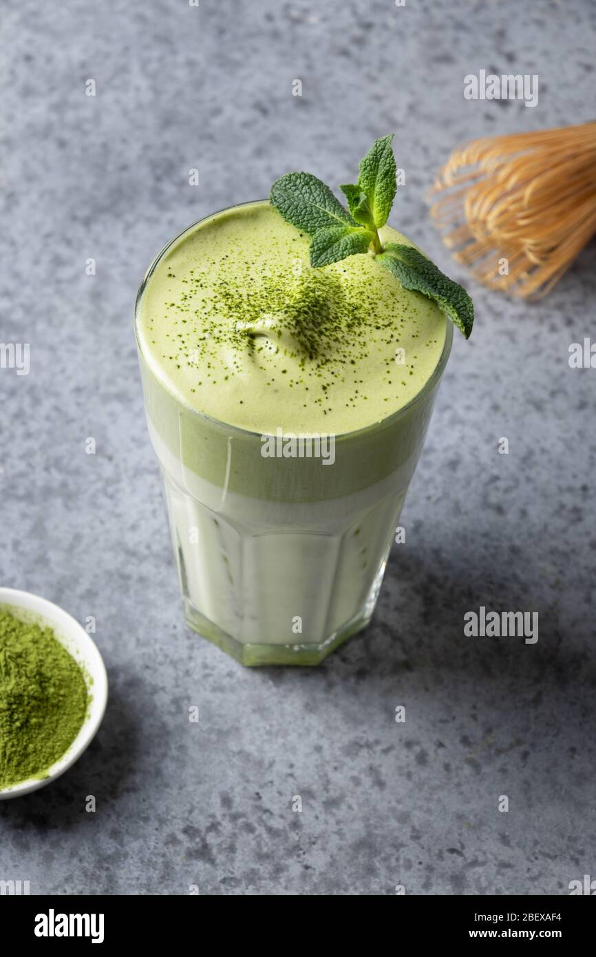 Dalgona Iced Matcha tea. Whipped white eggs with matcha tea is added to ...