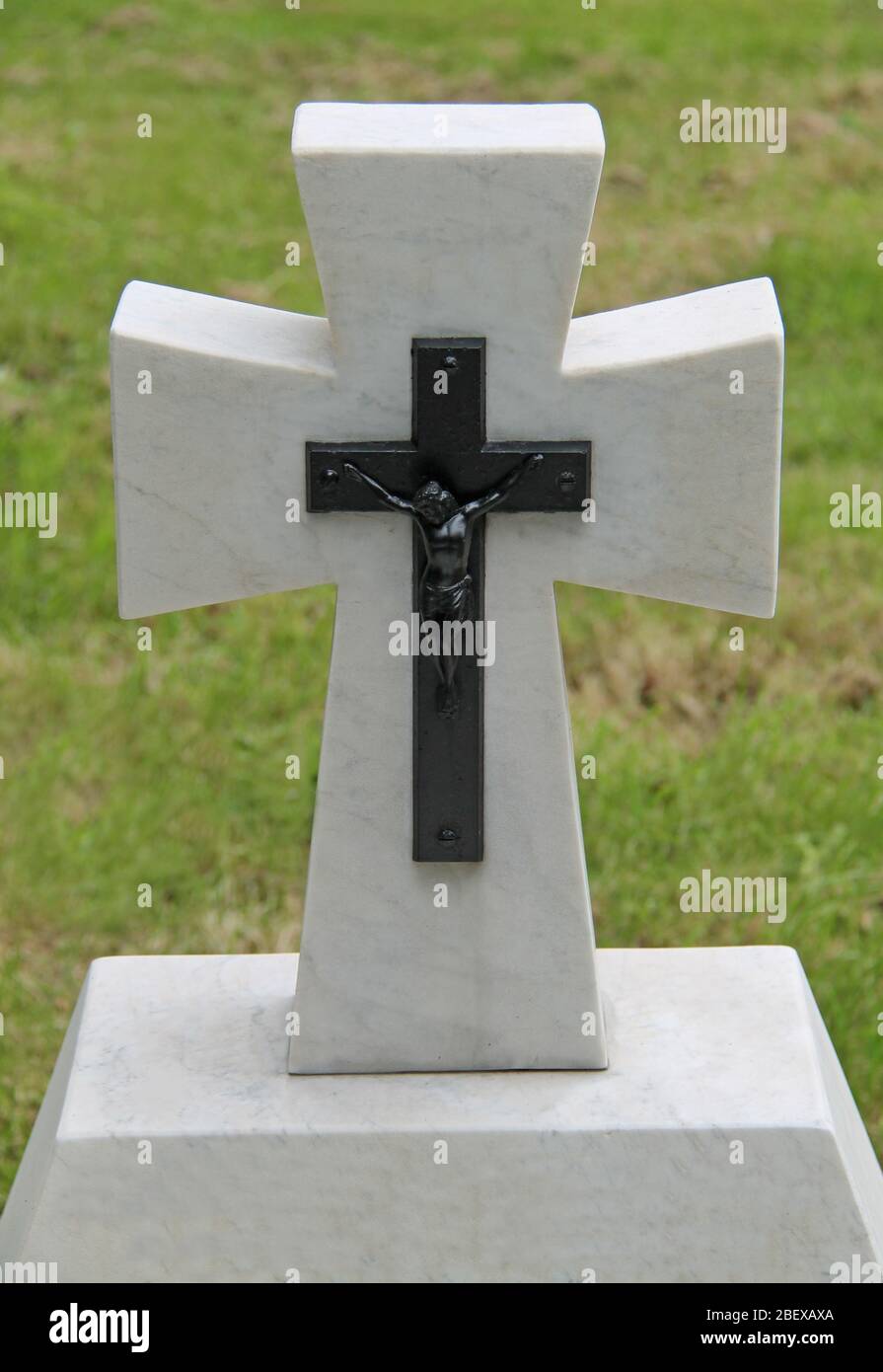A Crucifix of Jesus Christ on a Marble Cross Stock Photo - Alamy