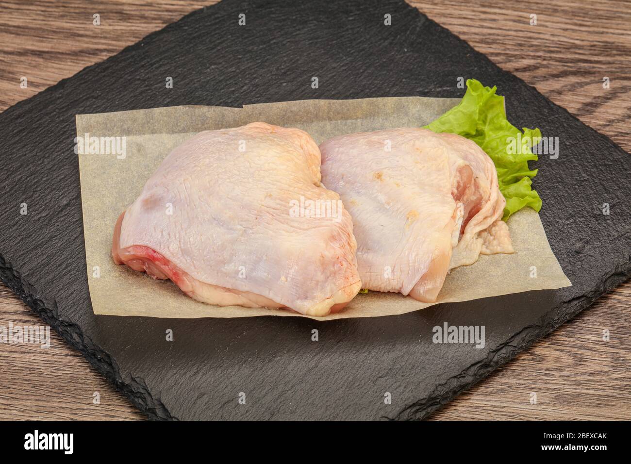 Raw chicken hip ready for cooking Stock Photo - Alamy