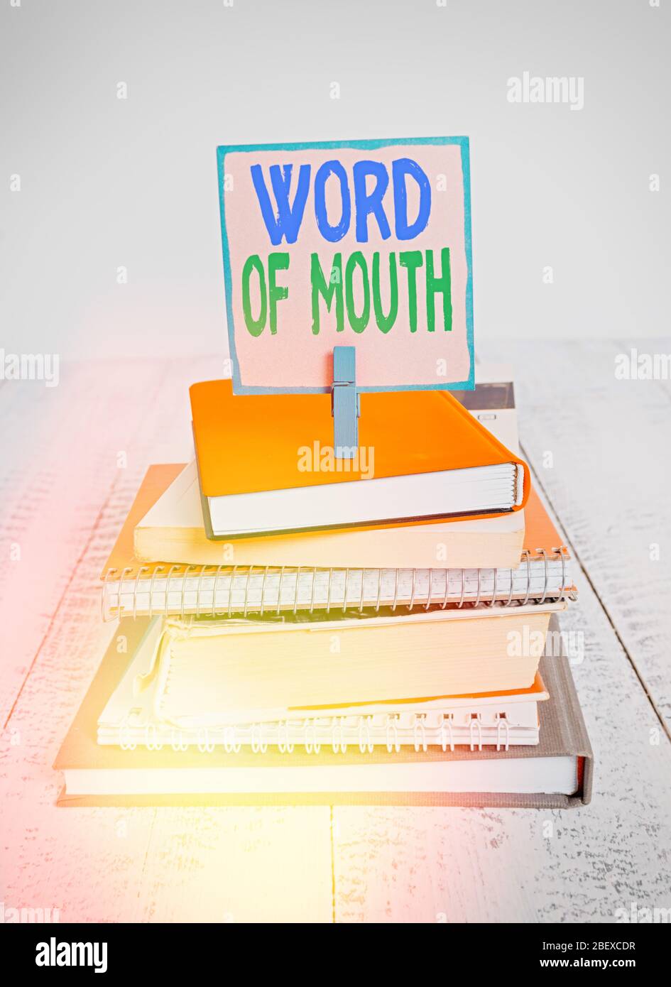 Writing note showing Word Of Mouth. Business concept for information ...