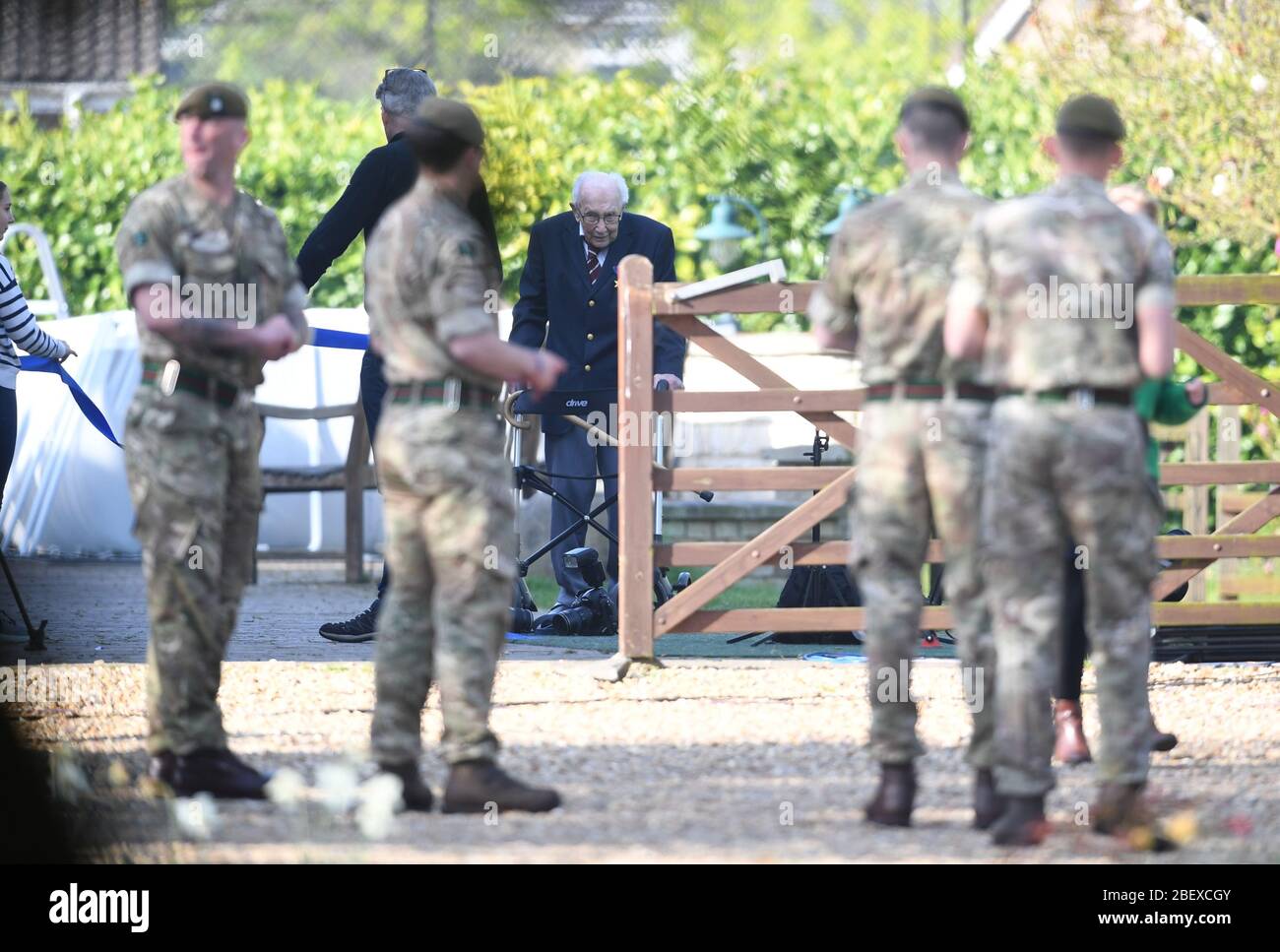 Captain Tom Moore, a 99-year-old veteran, completing the 100th length ...