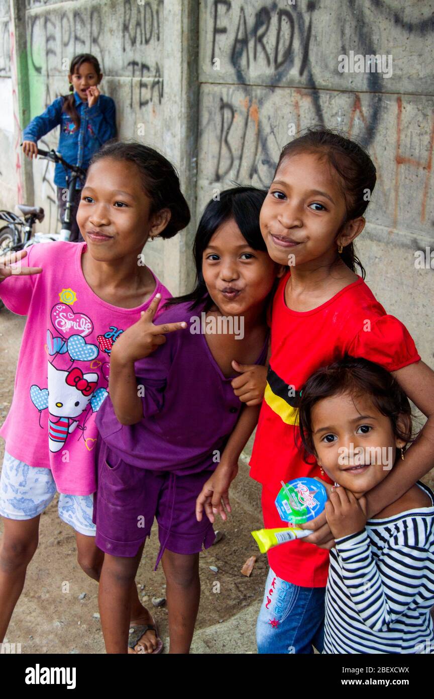 Indonesian Children posing in front of the camera with funny faces ...