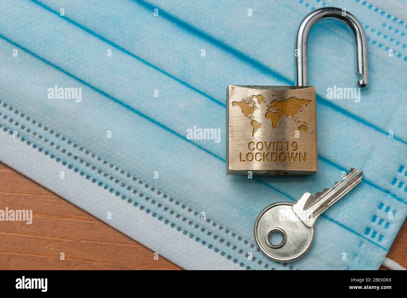 Coronavirus world lockdown end: an open lock with a world map and the ...