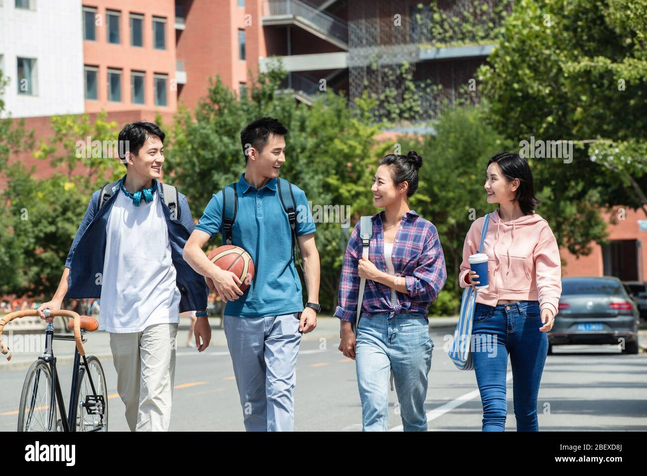 Happiness of college students walking in the campus Stock Photo - Alamy