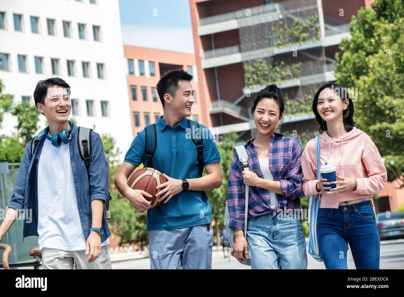 Happiness of college students walking in the campus Stock Photo - Alamy
