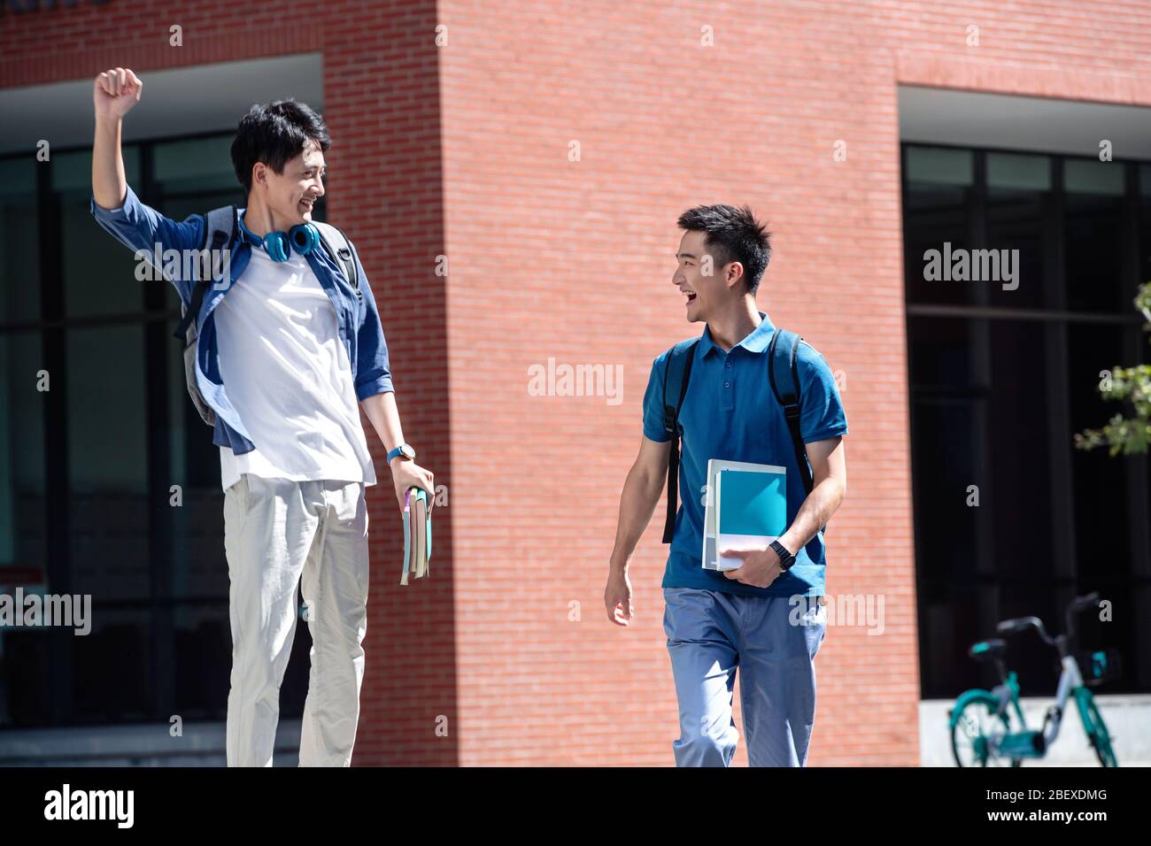 The young man on campus just class is over Stock Photo - Alamy