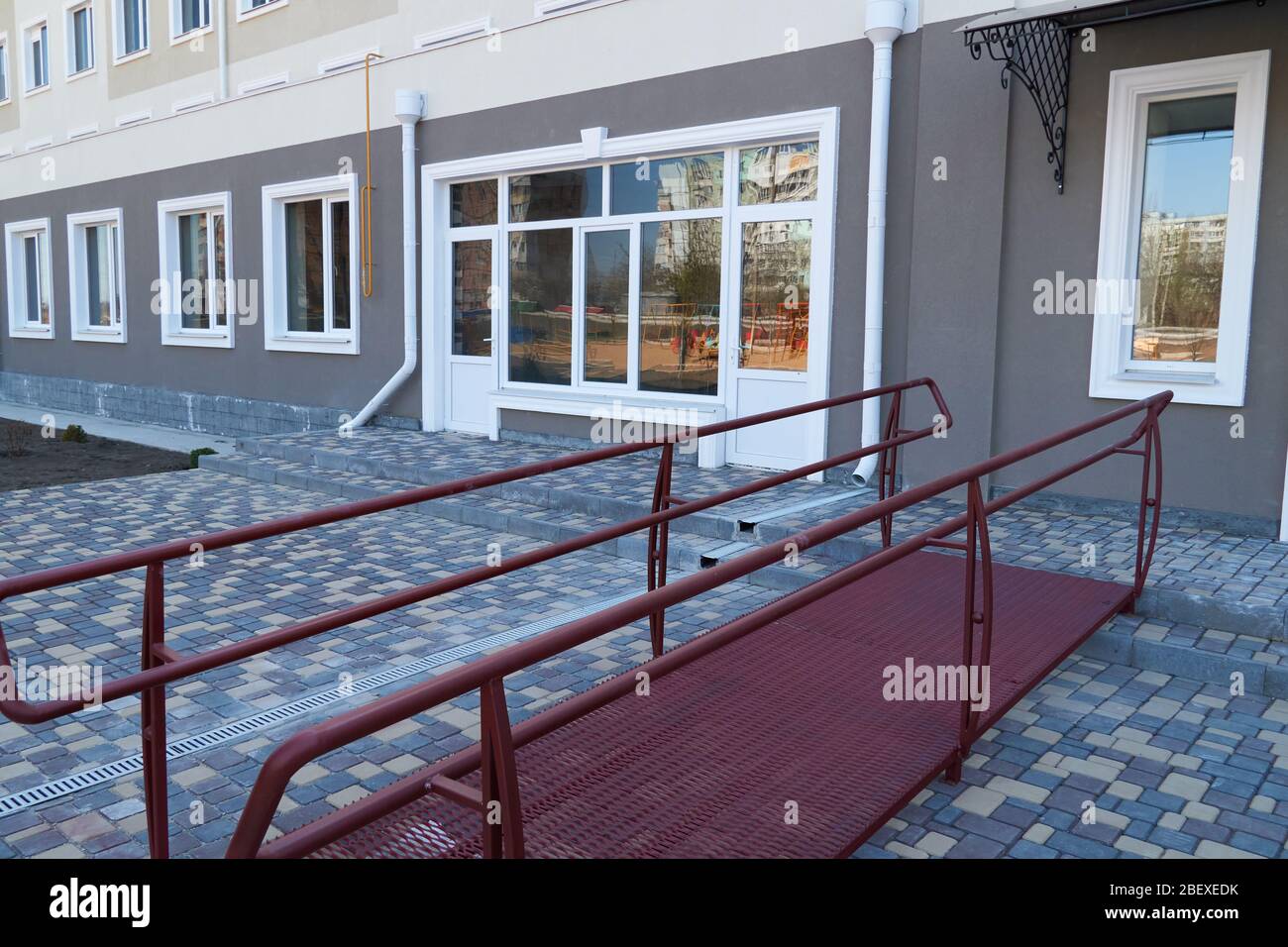 Wheelchair access ramp for entrance of residential multistory building ...