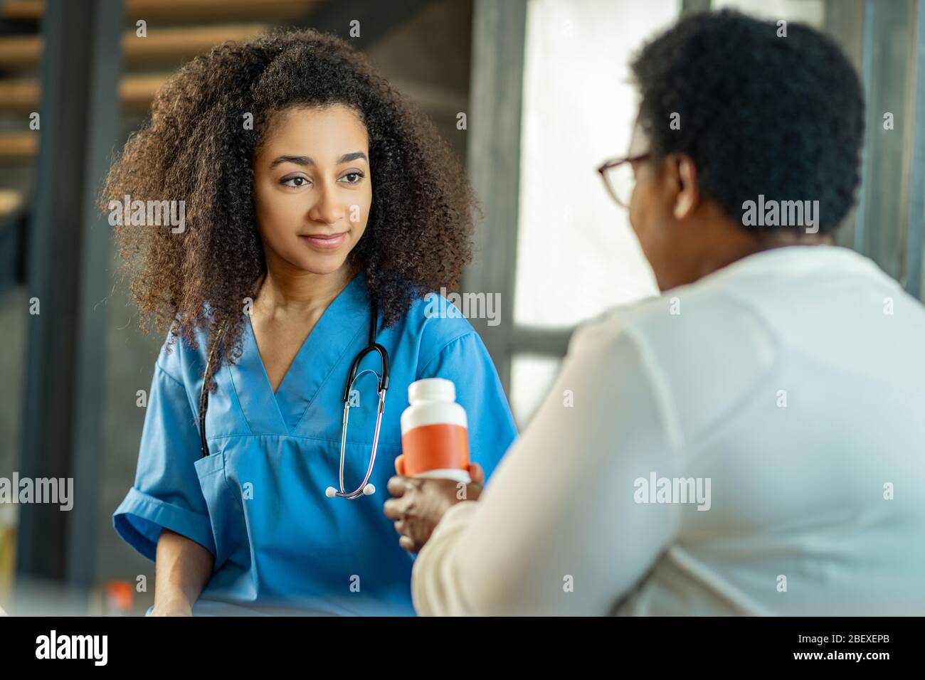 American doctor offering hi-res stock photography and images - Alamy