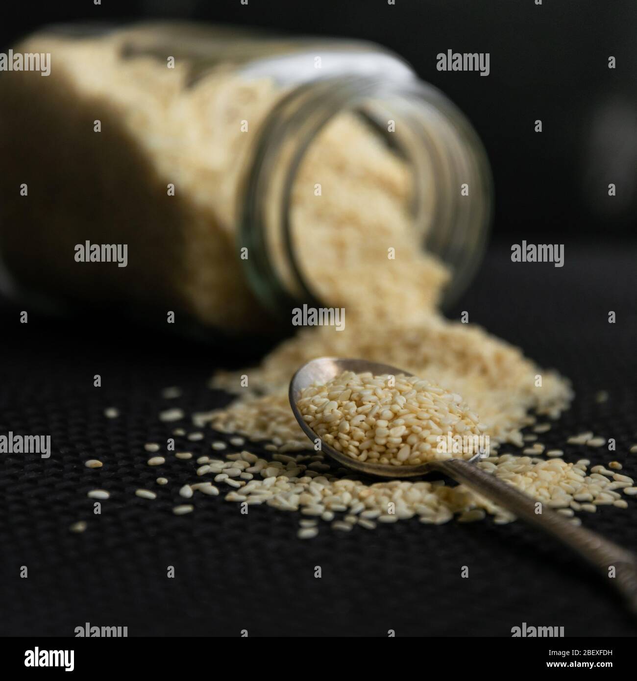 Close up view of dry sesame seeds. Natural oil-rich food Stock Photo ...