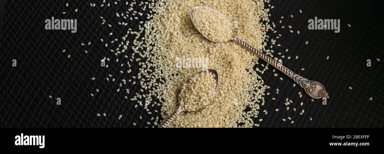 Close up view of dry sesame seeds. Natural oil-rich food Stock Photo ...